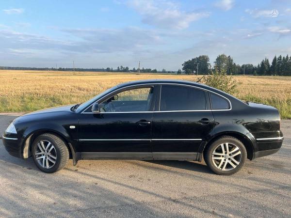 Volkswagen Passat 2001 Kauņa vietnē Melns Volkswagen Passat 2001 Kauņa, ar dzinēja tilpumu 2.77 L un nobraukumu 95 tūkst. km par 2500 €, foto 3 vietnē AUTOMOTO.COM.LV