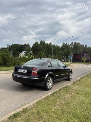 Black Volkswagen Passat 2003 in Vilnius, with an engine capacity of 2.50 L and mileage of 330 thousand km for 1200 €, photo 9 on AUTOMOTO.COM.LV