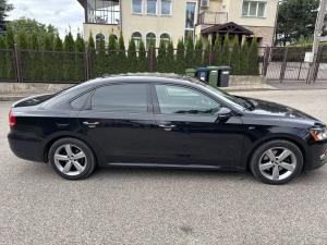 Black Volkswagen Passat 2012 in Vilnius, with an engine capacity of 2.50 L and mileage of 199 thousand km for 5699 €, photo 5 on AUTOMOTO.COM.LV