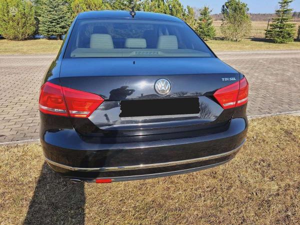 Black Volkswagen Passat 2013 in Vilnius, with an engine capacity of 1.97 L and mileage of 315 thousand km for 5700 €, photo 3 on AUTOMOTO.COM.LV