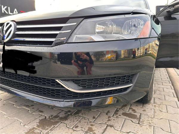 Black Volkswagen Passat 2015 in Panevezys, with an engine capacity of 1.80 L and mileage of 253 thousand km for 4500 €, photo 6 on AUTOMOTO.COM.LV