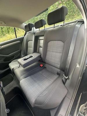 Black Volkswagen Passat 2022 in Vilnius, with an engine capacity of 1.50 L and mileage of 63 thousand km for 19900 €, photo 8 on AUTOMOTO.COM.LV