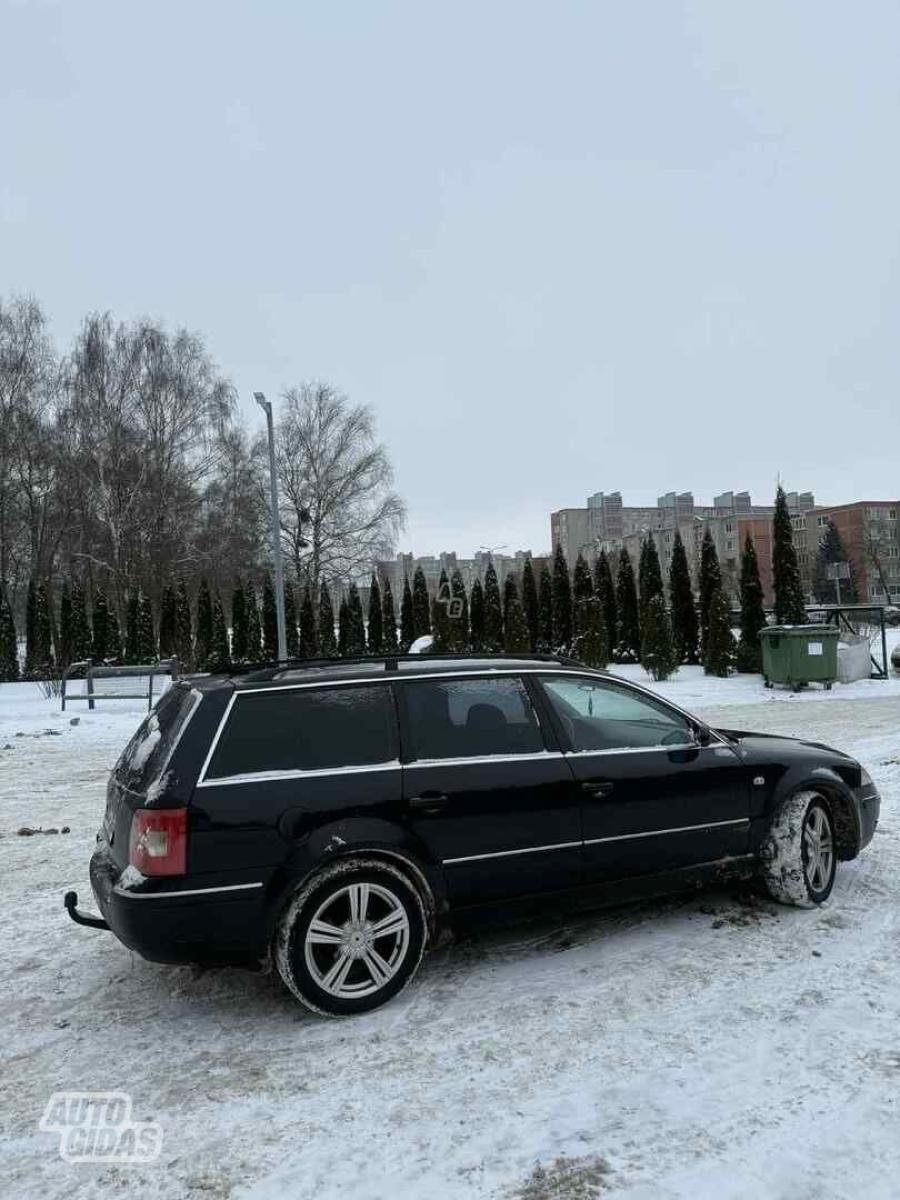 Black Volkswagen Passat 2003 in Vilnius, with an engine capacity of 2.50 L and mileage of 340 thousand km for 1450 €, photo 4 on AUTOMOTO.COM.LV