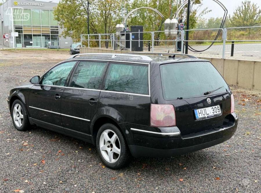 Black Volkswagen Passat 2004 in Kaunas, with an engine capacity of 2.50 L and mileage of 288 thousand km for 499 €, photo 6 on AUTOMOTO.COM.LV