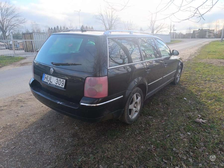 Melns Volkswagen Passat 2004 Marijampole, ar dzinēja tilpumu 2.50 L un nobraukumu 280 tūkst. km par 800 €, foto 3 vietnē AUTOMOTO.COM.LV