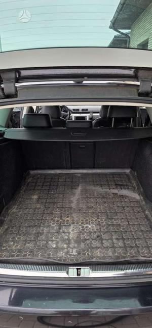 Black Volkswagen Passat 2008 in Klaipeda, with an engine capacity of 1.98 L and mileage of 238 thousand km for 1599 €, photo 11 on AUTOMOTO.COM.LV
