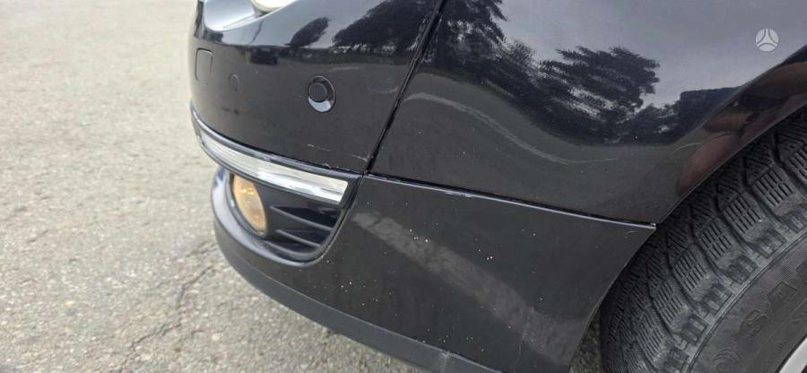Black Volkswagen Passat 2008 in Klaipeda, with an engine capacity of 1.98 L and mileage of 238 thousand km for 1599 €, photo 18 on AUTOMOTO.COM.LV