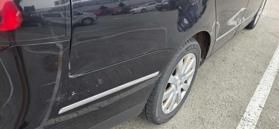 Black Volkswagen Passat 2008 in Klaipeda, with an engine capacity of 1.98 L and mileage of 238 thousand km for 1599 €, photo 24 on AUTOMOTO.COM.LV