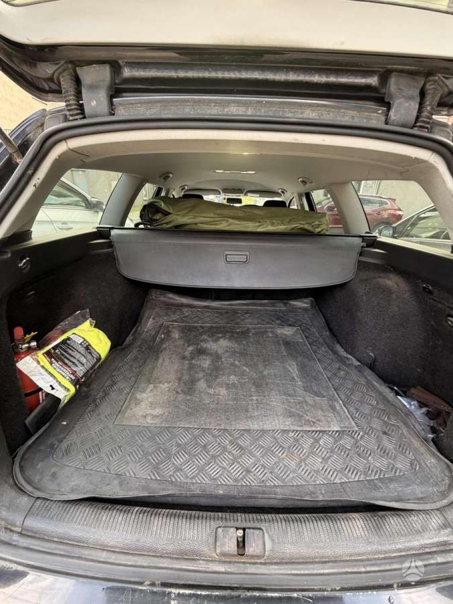 Melns Volkswagen Passat 2008 Viļņa, ar dzinēja tilpumu 1.97 L un nobraukumu 428 tūkst. km par 1000 €, foto 8 vietnē AUTOMOTO.COM.LV