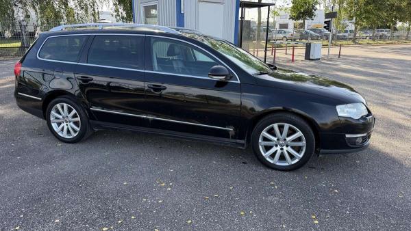 Black Volkswagen Passat 2009 in Marijampole, with an engine capacity of 1.97 L and mileage of 239 thousand km for 1500 €, photo 6 on AUTOMOTO.COM.LV