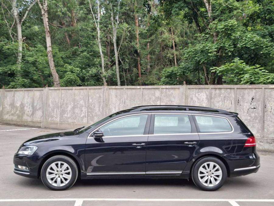 Black Volkswagen Passat 2011 in Vilnius, with an engine capacity of 1.80 L and mileage of 202 thousand km for 3850 €, photo 4 on AUTOMOTO.COM.LV