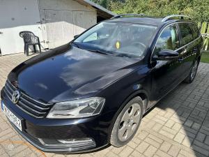 Black Volkswagen Passat 2012 in Vilnius, with an engine capacity of 1.39 L and mileage of 236 thousand km for 4990 €, photo 2 on AUTOMOTO.COM.LV