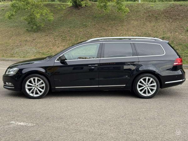 Black Volkswagen Passat 2012 in Jonava, with an engine capacity of 2.00 L and mileage of 330 thousand km for 6499 €, photo 7 on AUTOMOTO.COM.LV