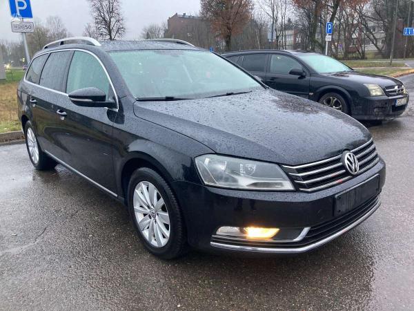 Black Volkswagen Passat 2013 in Kaunas, with an engine capacity of 1.60 L and mileage of 218 thousand km for 5950 €, photo 2 on AUTOMOTO.COM.LV