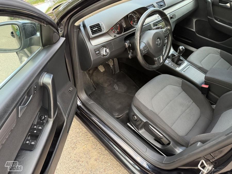 Black Volkswagen Passat 2013 in Alytus, with an engine capacity of 1.60 L and mileage of 254 thousand km for 4699 €, photo 15 on AUTOMOTO.COM.LV