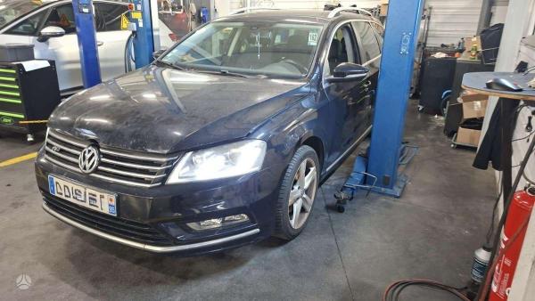 Black Volkswagen Passat 2014 in Vilnius, with an engine capacity of 1.60 L and mileage of 201 thousand km for 5500 €, photo 2 on AUTOMOTO.COM.LV