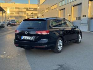 Black Volkswagen Passat 2019 in Vilnius, with an engine capacity of 1.50 L and mileage of 156 thousand km for 15600 €, photo 4 on AUTOMOTO.COM.LV