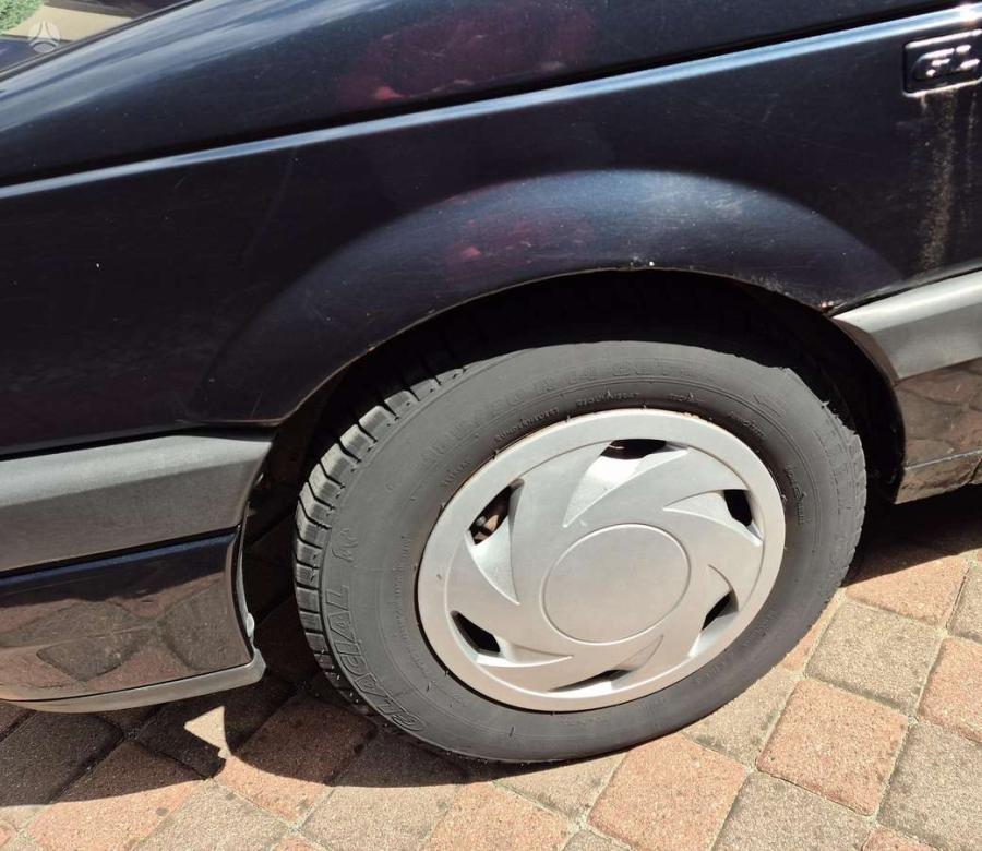 Blue Volkswagen Passat 1991 in Kaunas, with an engine capacity of 1.78 L and mileage of 94 thousand km for 2200 €, photo 10 on AUTOMOTO.COM.LV