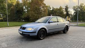 Blue Volkswagen Passat 1998 in Vilnius, with an engine capacity of 1.80 L and mileage of 298 thousand km for 1250 €, photo  on AUTOMOTO.COM.LV