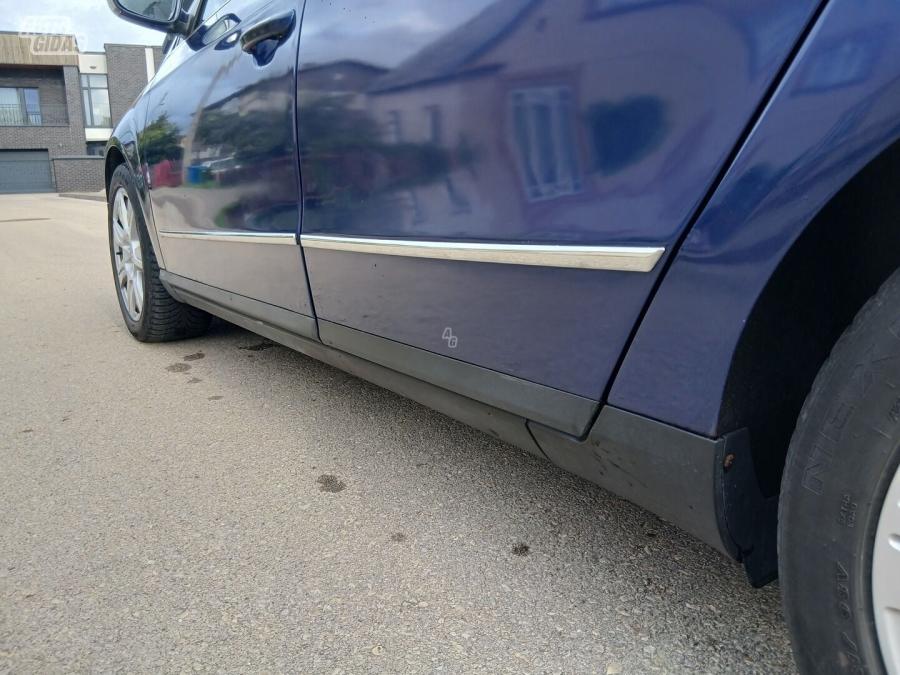 Blue Volkswagen Passat 2007 in Alytus, with an engine capacity of 1.90 L and mileage of 387 thousand km for 1600 €, photo 10 on AUTOMOTO.COM.LV