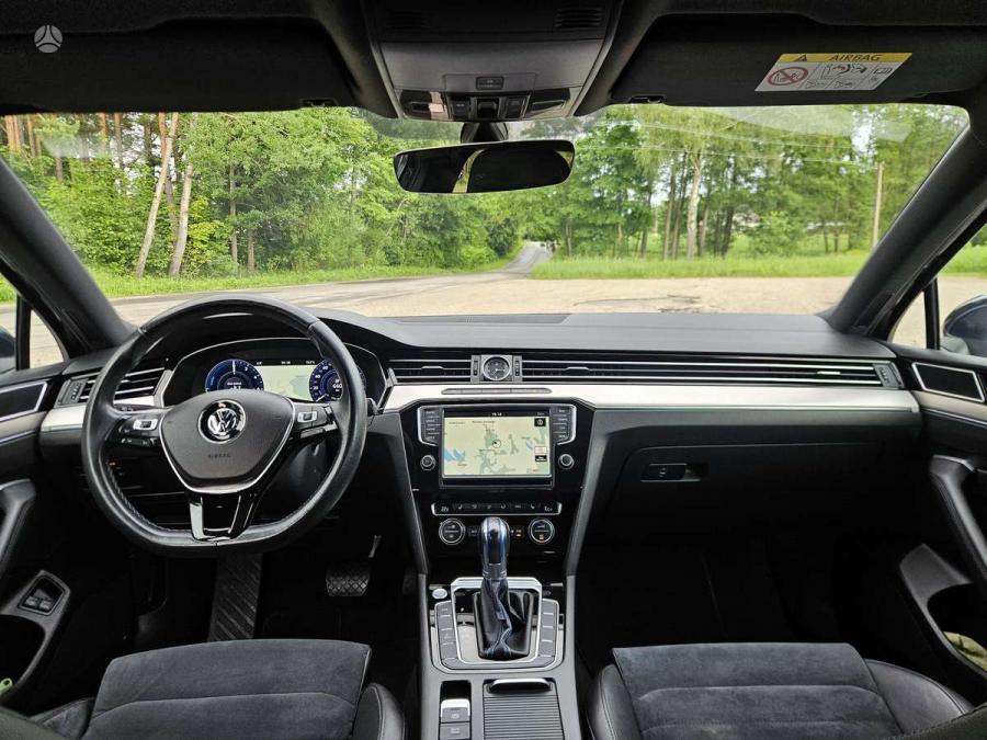 Blue Volkswagen Passat 2016 in Alytus, with an engine capacity of 1.40 L and mileage of 205 thousand km for 10699 €, photo 28 on AUTOMOTO.COM.LV