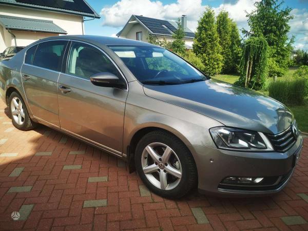 Brown Volkswagen Passat 2014 in Vilnius, with an engine capacity of 1.60 L and mileage of 214 thousand km for 5995 €, photo 4 on AUTOMOTO.COM.LV