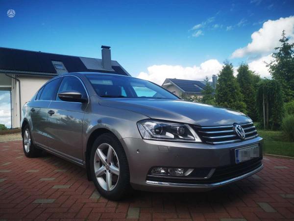 Brown Volkswagen Passat 2014 in Vilnius, with an engine capacity of 1.60 L and mileage of 214 thousand km for 5995 €, photo 5 on AUTOMOTO.COM.LV