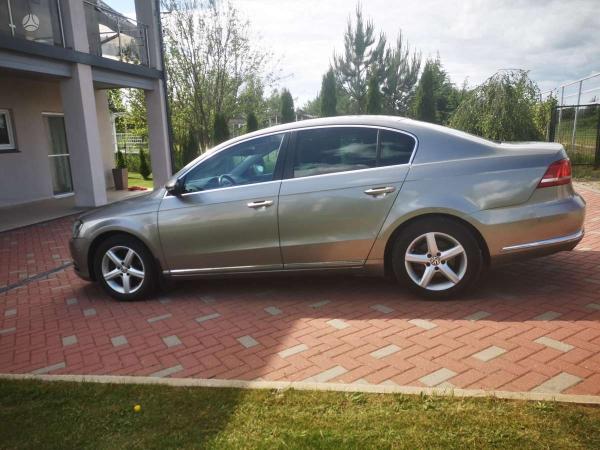 Brown Volkswagen Passat 2014 in Vilnius, with an engine capacity of 1.60 L and mileage of 214 thousand km for 5995 €, photo 6 on AUTOMOTO.COM.LV