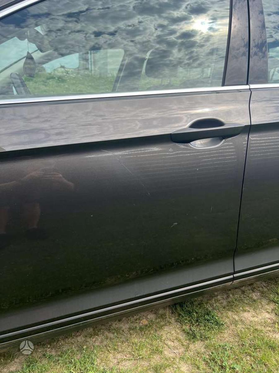 Brown Volkswagen Passat 2015 in Vilnius, with an engine capacity of 1.60 L and mileage of 340 thousand km for 7399 €, photo 14 on AUTOMOTO.COM.LV