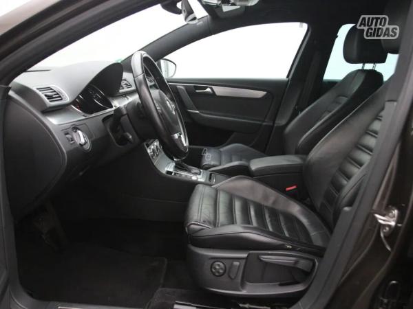 Brown Volkswagen Passat 2014 in Vilnius, with an engine capacity of 1.40 L and mileage of 223 thousand km for 8599 €, photo 4 on AUTOMOTO.COM.LV