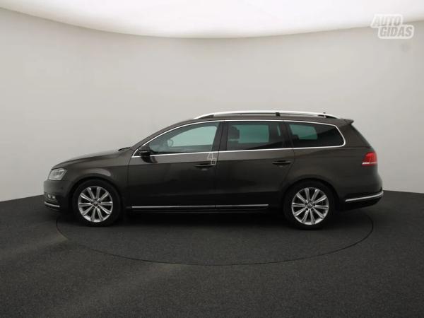 Brown Volkswagen Passat 2014 in Vilnius, with an engine capacity of 1.40 L and mileage of 223 thousand km for 8599 €, photo 6 on AUTOMOTO.COM.LV