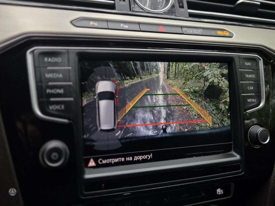 Brown Volkswagen Passat 2015 in Vilnius, with an engine capacity of 1.97 L and mileage of 310 thousand km for 9399 €, photo 15 on AUTOMOTO.COM.LV