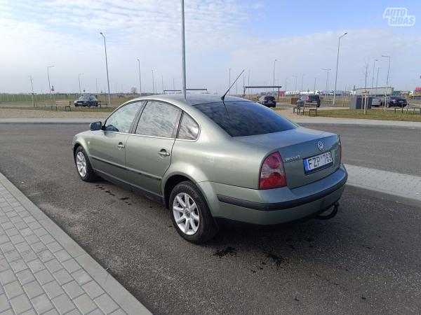 Zaļš Volkswagen Passat 2003 Marijampole, ar dzinēja tilpumu 1.90 L un nobraukumu 395 tūkst. km par 1550 €, foto 5 vietnē AUTOMOTO.COM.LV