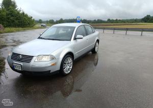 Pelēks Volkswagen Passat 2003 Telšiai, ar dzinēja tilpumu 1.80 L un nobraukumu 311 tūkst. km par 1950 €, foto  vietnē AUTOMOTO.COM.LV