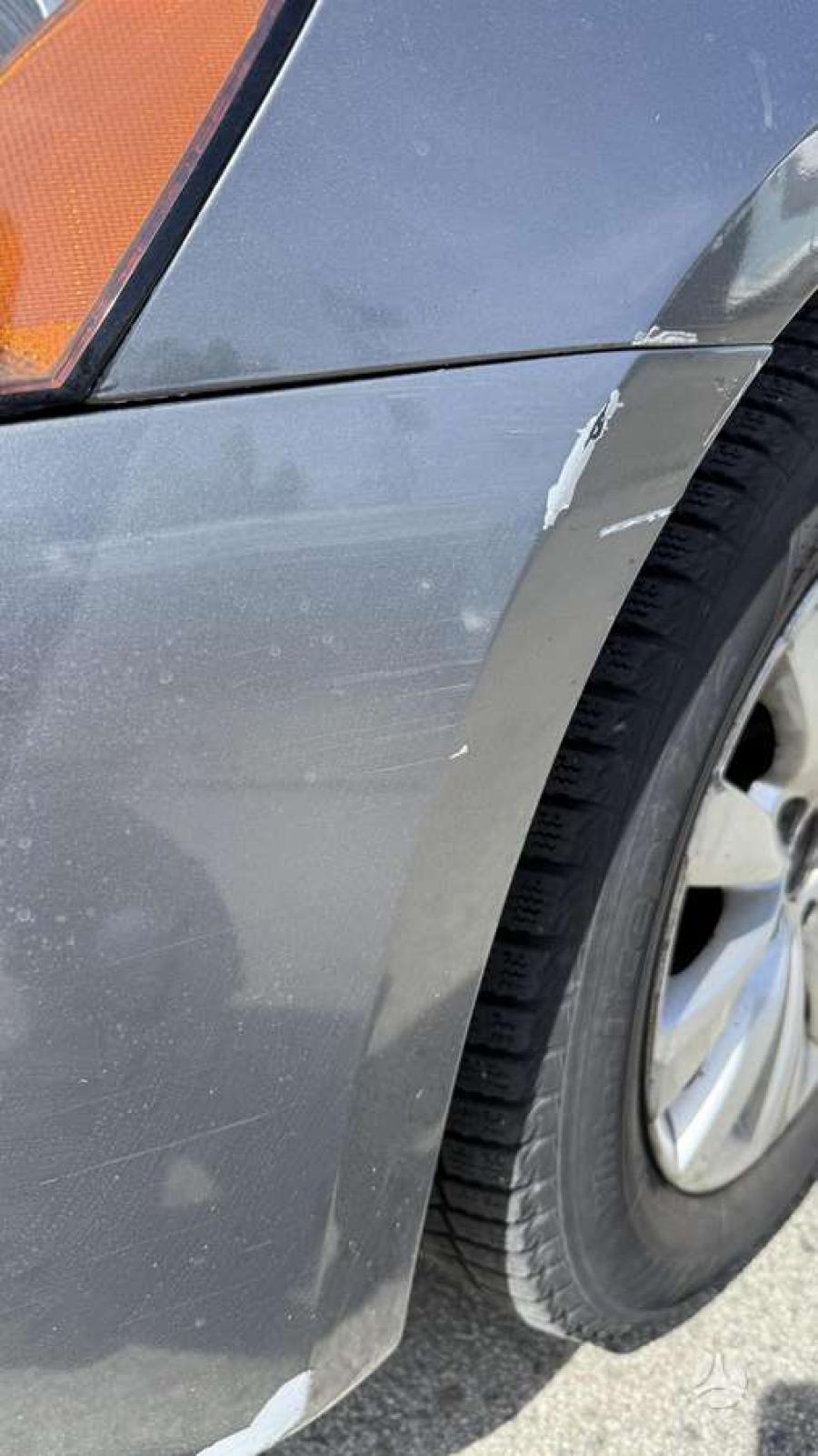 Grey Volkswagen Passat 2012 in Vilnius, with an engine capacity of 2.50 L and mileage of 179 thousand km for 3900 €, photo 22 on AUTOMOTO.COM.LV