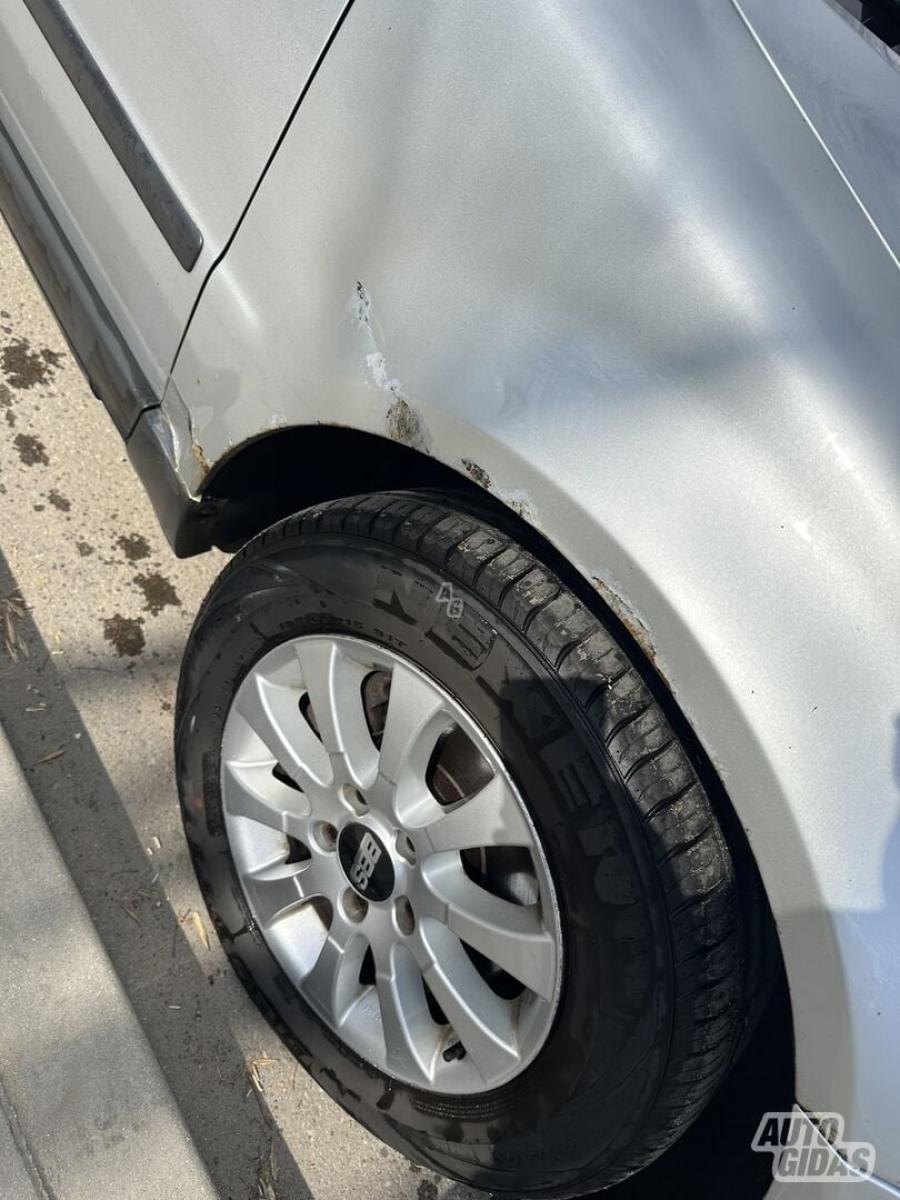 Grey Volkswagen Passat 2004 in Vilkaviskis, with an engine capacity of 1.90 L and mileage of 358 thousand km for 1550 €, photo 13 on AUTOMOTO.COM.LV