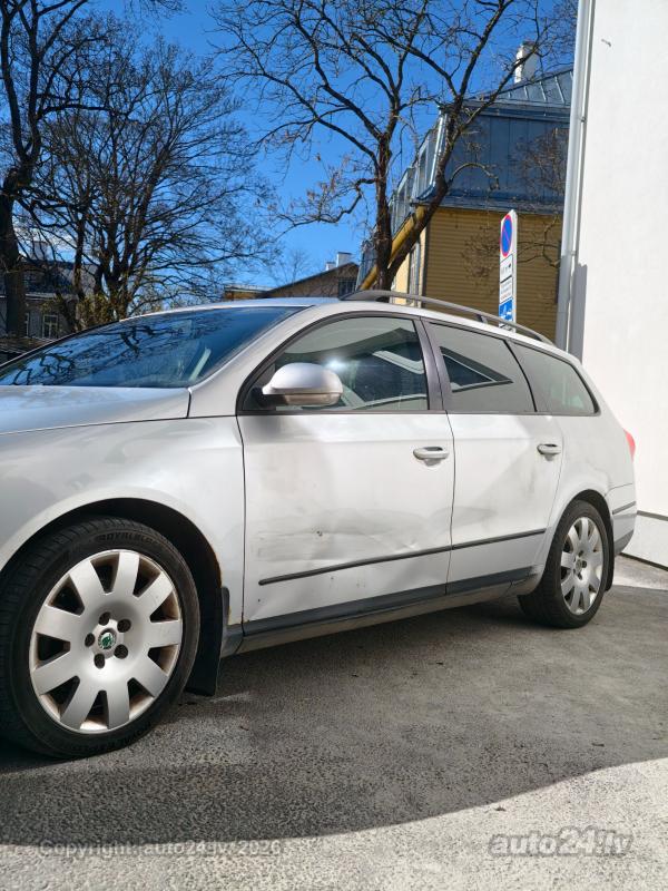 Grey Volkswagen Passat 2009 in Tallinn, with an engine capacity of 1.90 L and mileage of 403 thousand km for 1400 €, photo 8 on AUTOMOTO.COM.LV