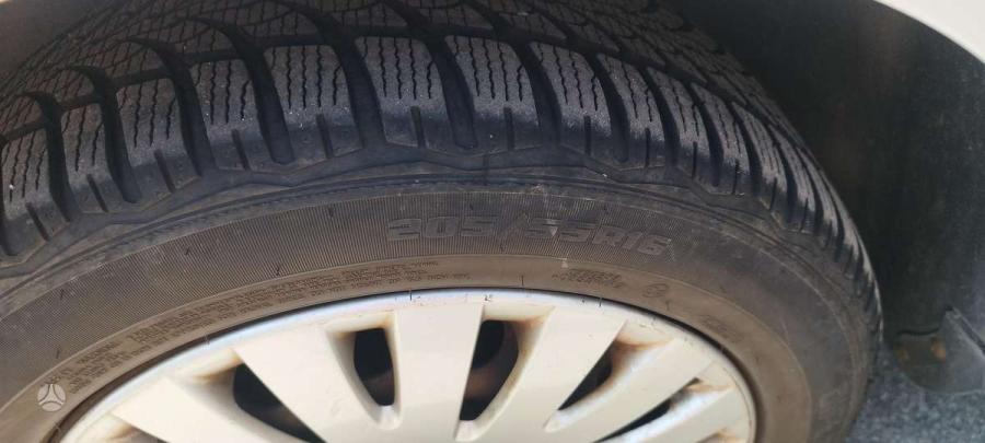 Grey Volkswagen Passat 2010 in Klaipeda, with an engine capacity of 2.00 L and mileage of 253 thousand km for 2850 €, photo 19 on AUTOMOTO.COM.LV