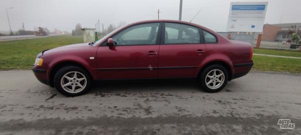 Red Volkswagen Passat 1999 in Radviliskis, with an engine capacity of 1.80 L and mileage of 262 thousand km for 950 €, photo 4 on AUTOMOTO.COM.LV