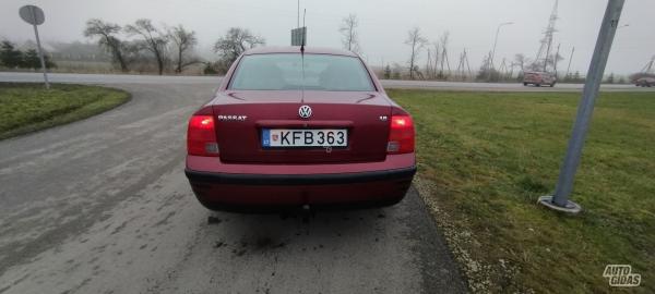 Red Volkswagen Passat 1999 in Radviliskis, with an engine capacity of 1.80 L and mileage of 262 thousand km for 950 €, photo 6 on AUTOMOTO.COM.LV