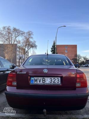 Sarkans Volkswagen Passat 1999 Panevēža, ar dzinēja tilpumu 1.80 L un nobraukumu 394 tūkst. km par 850 €, foto 13 vietnē AUTOMOTO.COM.LV