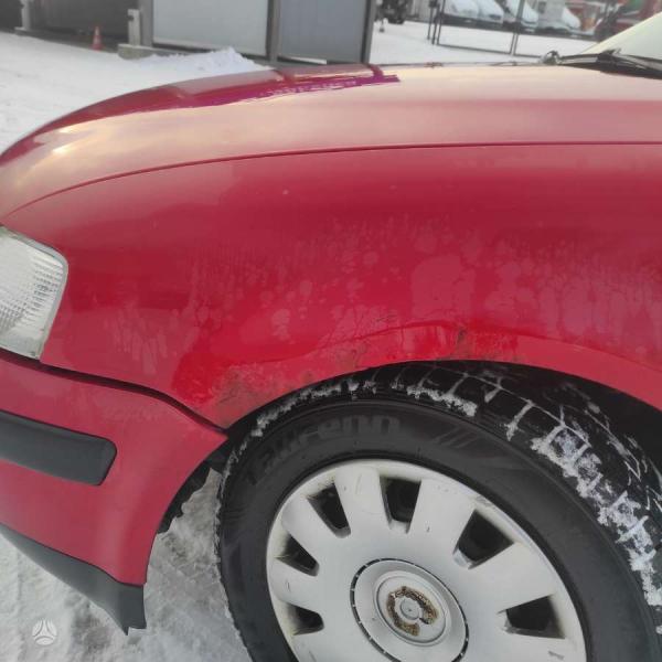 Sarkans Volkswagen Passat 1999 Kauņa, ar dzinēja tilpumu 1.90 L un nobraukumu 600 tūkst. km par 650 €, foto 9 vietnē AUTOMOTO.COM.LV