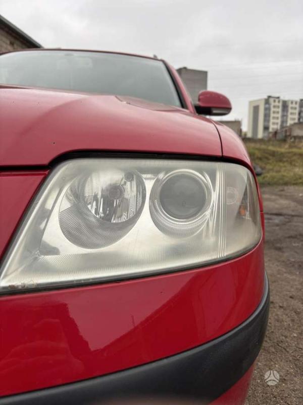 Red Volkswagen Passat 2005 in Alytus, with an engine capacity of 1.90 L and mileage of 205 thousand km for 1200 €, photo 10 on AUTOMOTO.COM.LV