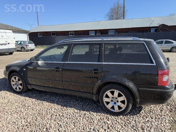 Black Volkswagen passat-variant 2003 in Jelgava, with an engine capacity of 1.90 L and mileage of 313 thousand km for 1300 €, photo 6 on AUTOMOTO.COM.LV