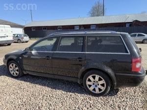 Black Volkswagen passat-variant 2003 in Jelgava, with an engine capacity of 1.90 L and mileage of 313 thousand km for 1300 €, photo 7 on AUTOMOTO.COM.LV