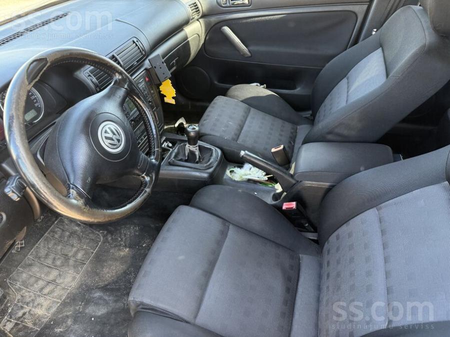Black Volkswagen passat-variant 2003 in Jelgava, with an engine capacity of 1.90 L and mileage of 313 thousand km for 1300 €, photo 9 on AUTOMOTO.COM.LV