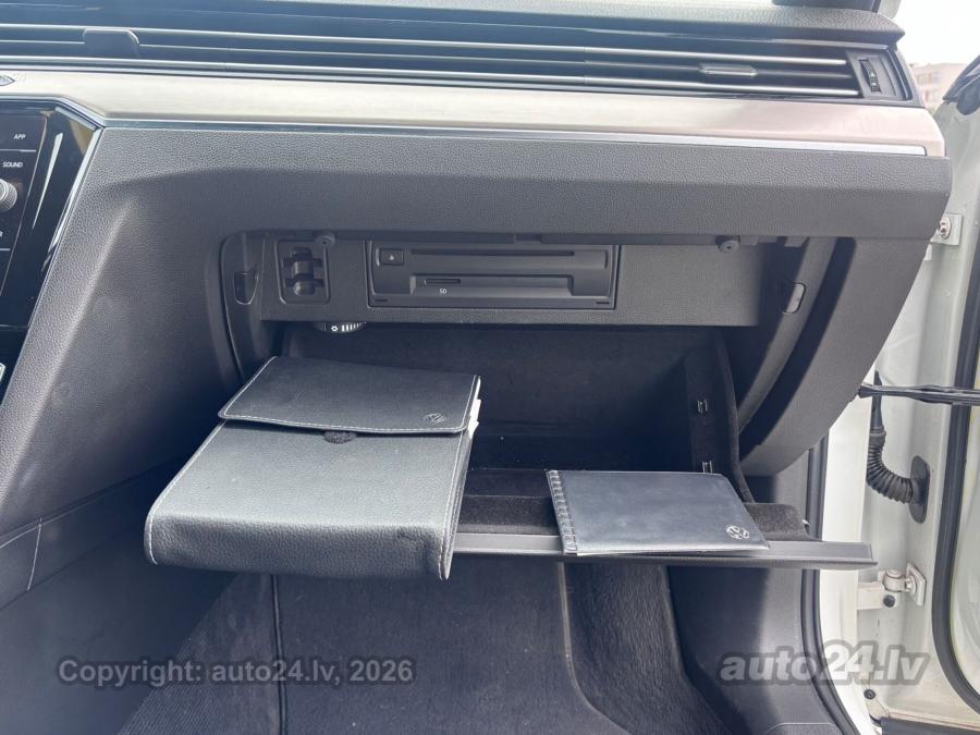 White Volkswagen Passat 2018 in Tallinn, with an engine capacity of 2.00 L and mileage of 301 thousand km for 15900 €, photo 14 on AUTOMOTO.COM.LV