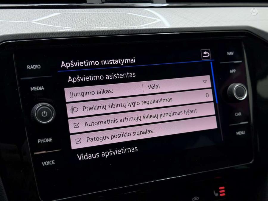 White Volkswagen Passat 2021 in Vilnius, with an engine capacity of 1.40 L and mileage of 156 thousand km for 20390 €, photo 24 on AUTOMOTO.COM.LV
