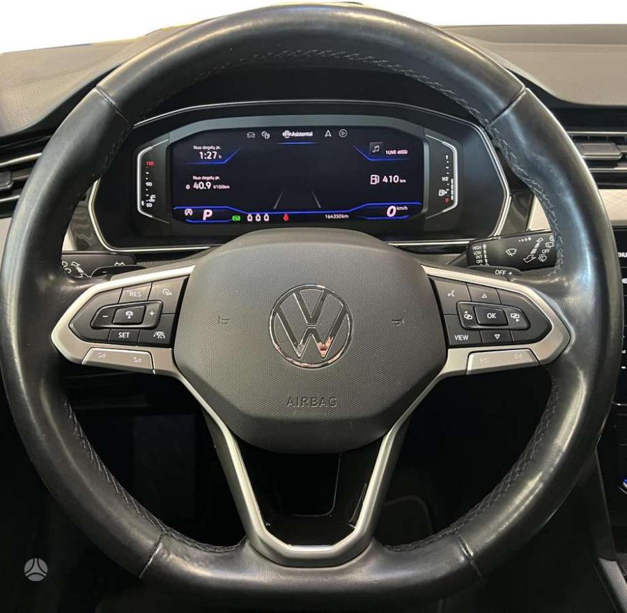 White Volkswagen Passat 2022 in Kaunas, with an engine capacity of 1.97 L and mileage of 164 thousand km for 18500 €, photo 9 on AUTOMOTO.COM.LV