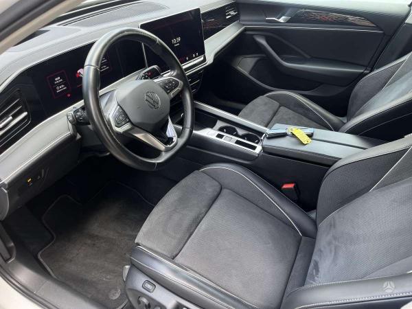 White Volkswagen Passat 2024 in Vilnius, with an engine capacity of 1.97 L and mileage of 172 thousand km for 23900 €, photo 9 on AUTOMOTO.COM.LV